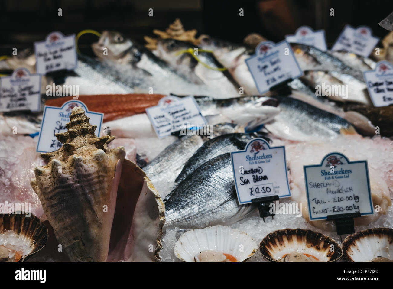 London, UK - July 24, 2018: Fresh fish on sale at a fishmonger stall in ...