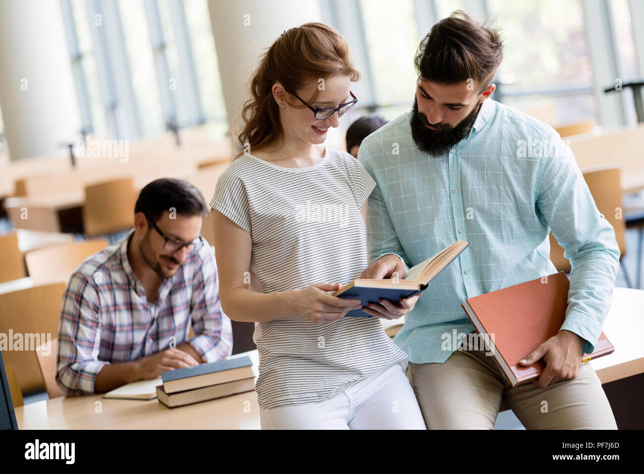 Boy studying library hi-res stock photography and images - Alamy