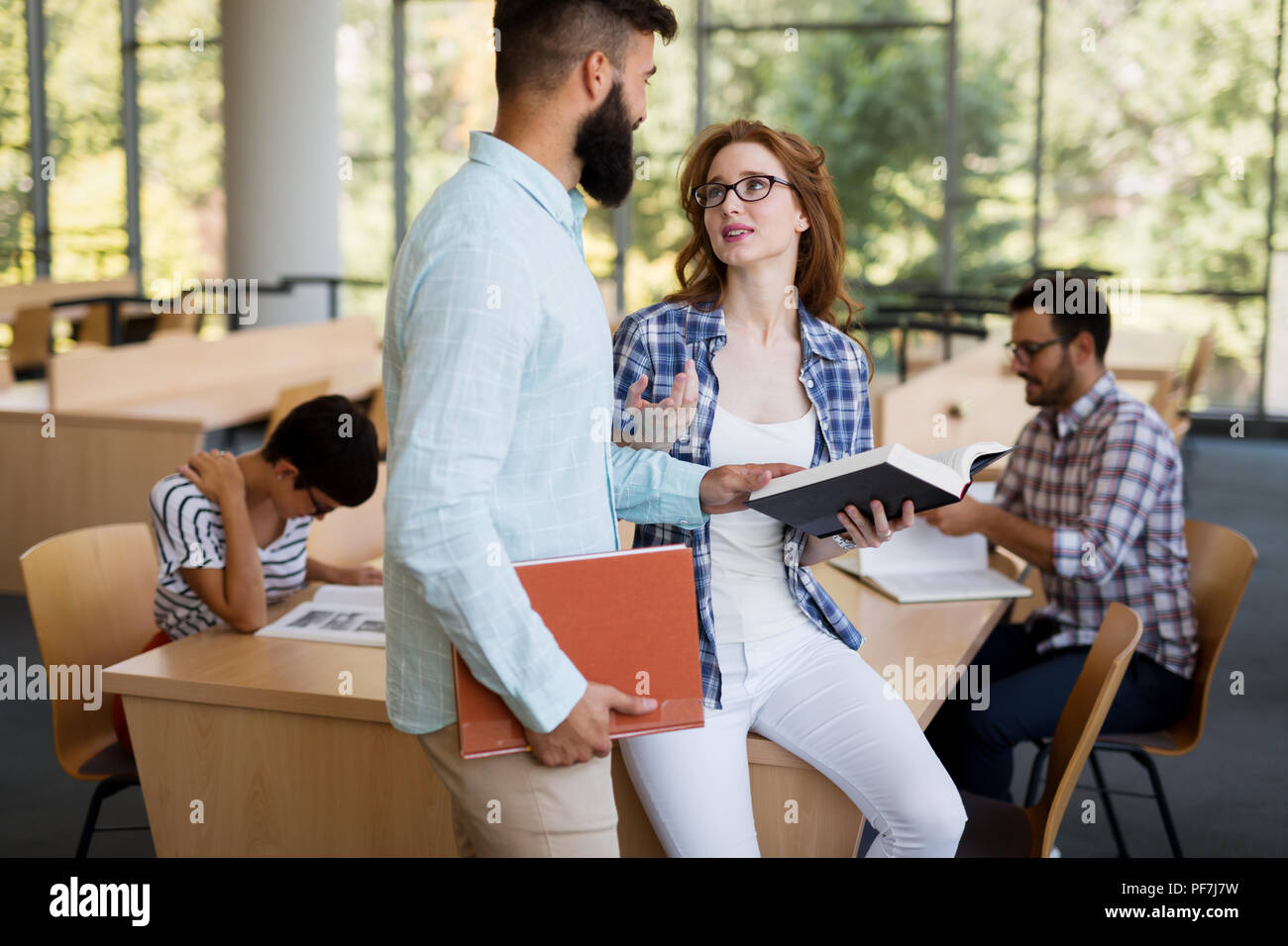 University students talking in class hi-res stock photography and ...
