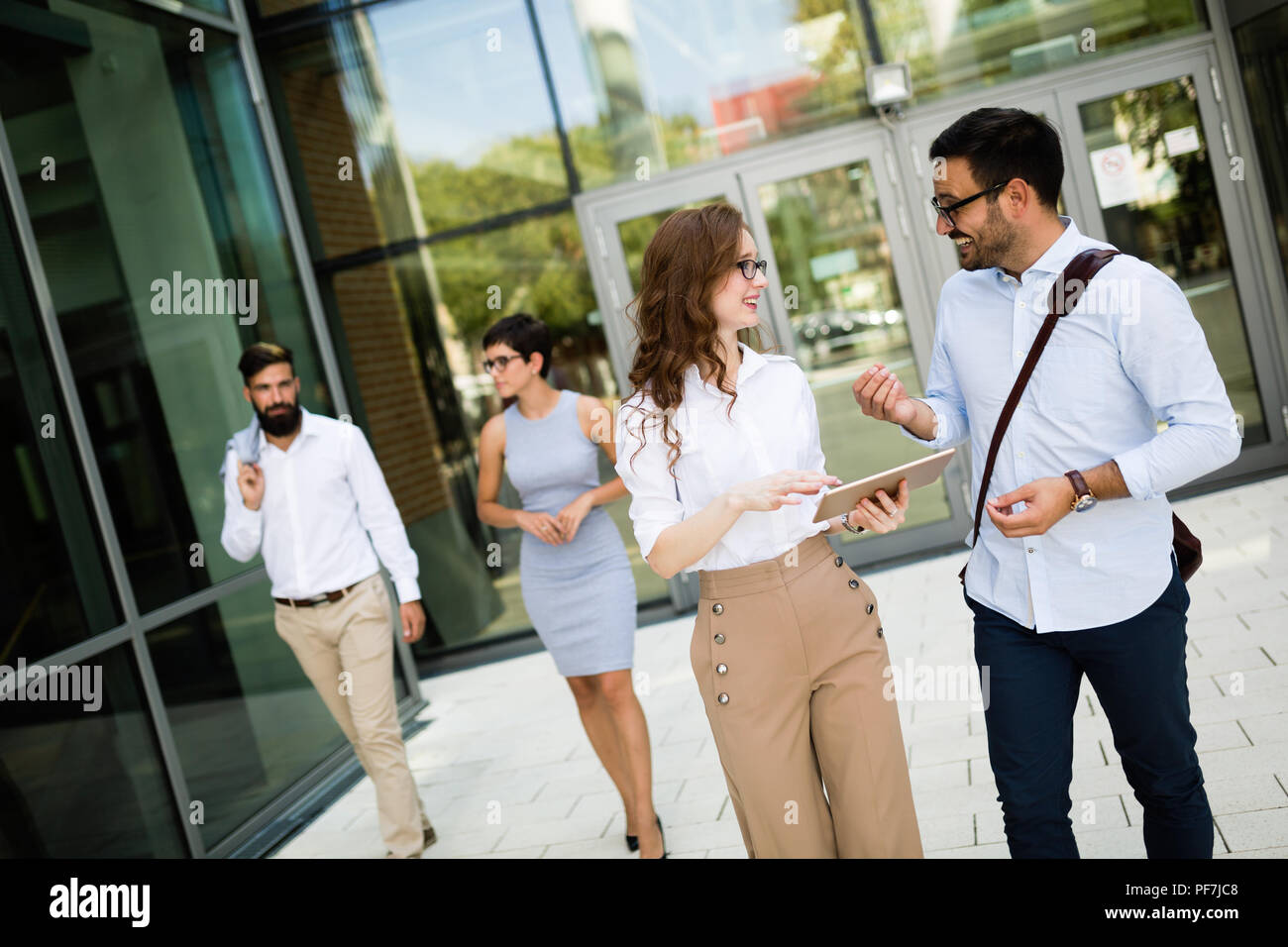 Picture of handsome man and beautiful woman as business partners Stock ...