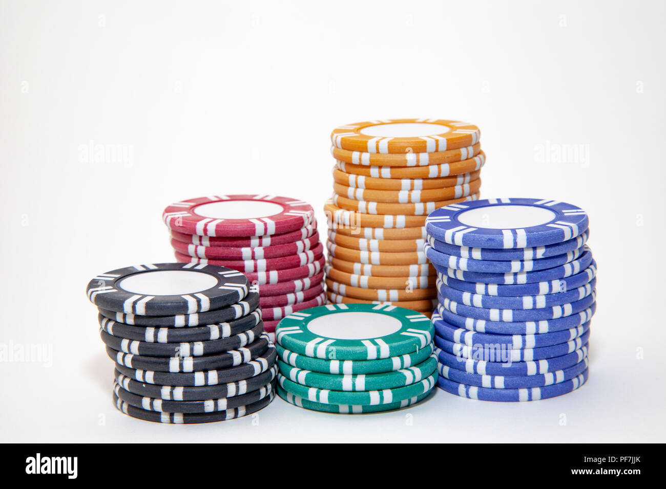 Stacked five color casino chips Stock Photo - Alamy