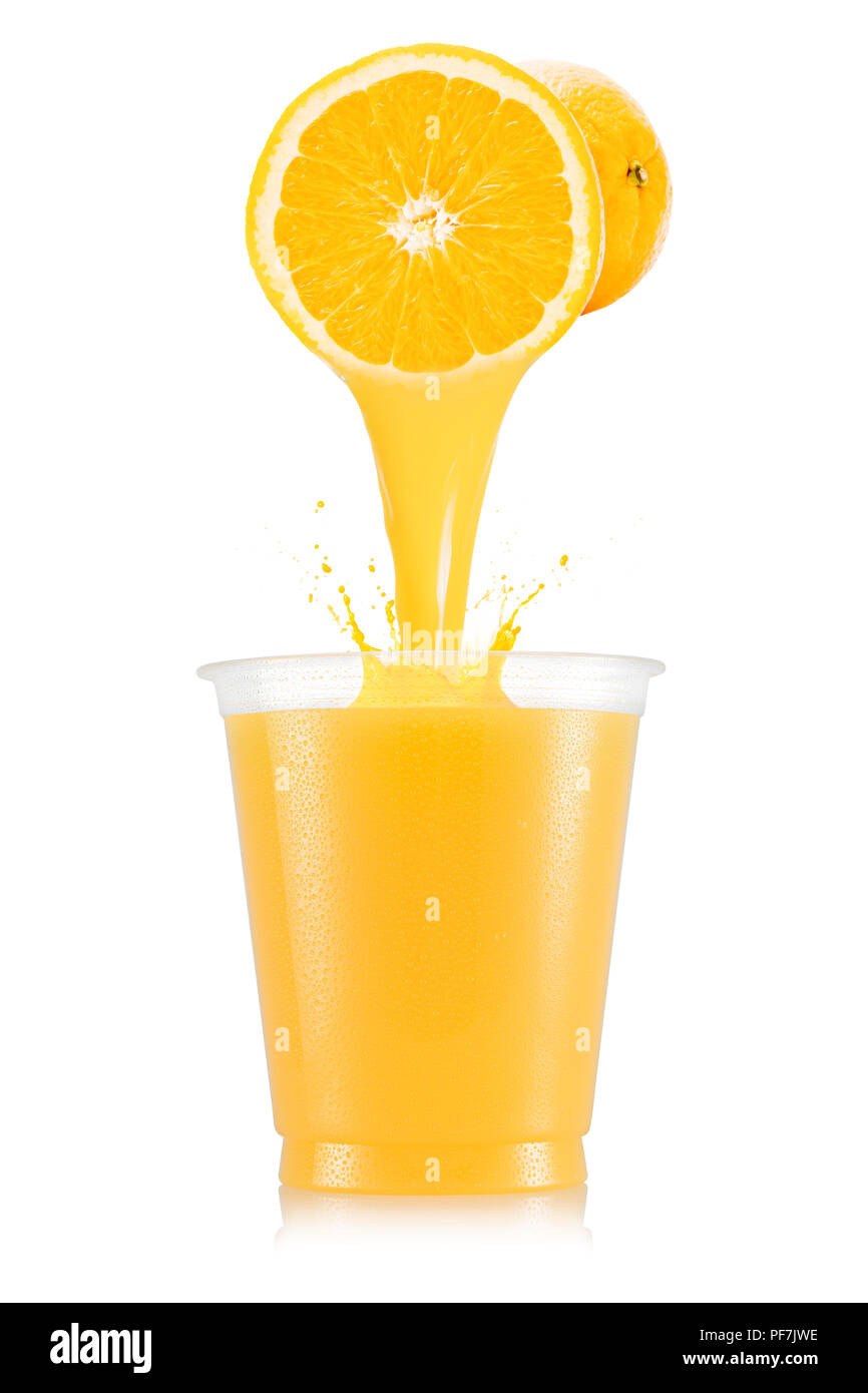 Pure orange juice pouring out from fruit into plastic cup isolated on ...