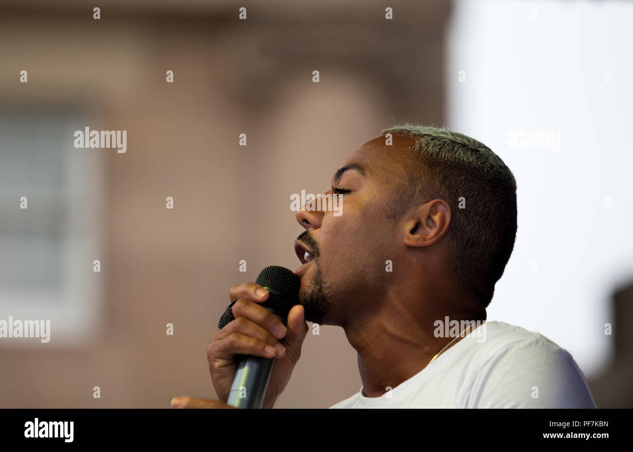 Marcus Collins performing on stage at the 2018 Chester Pride Festival ...