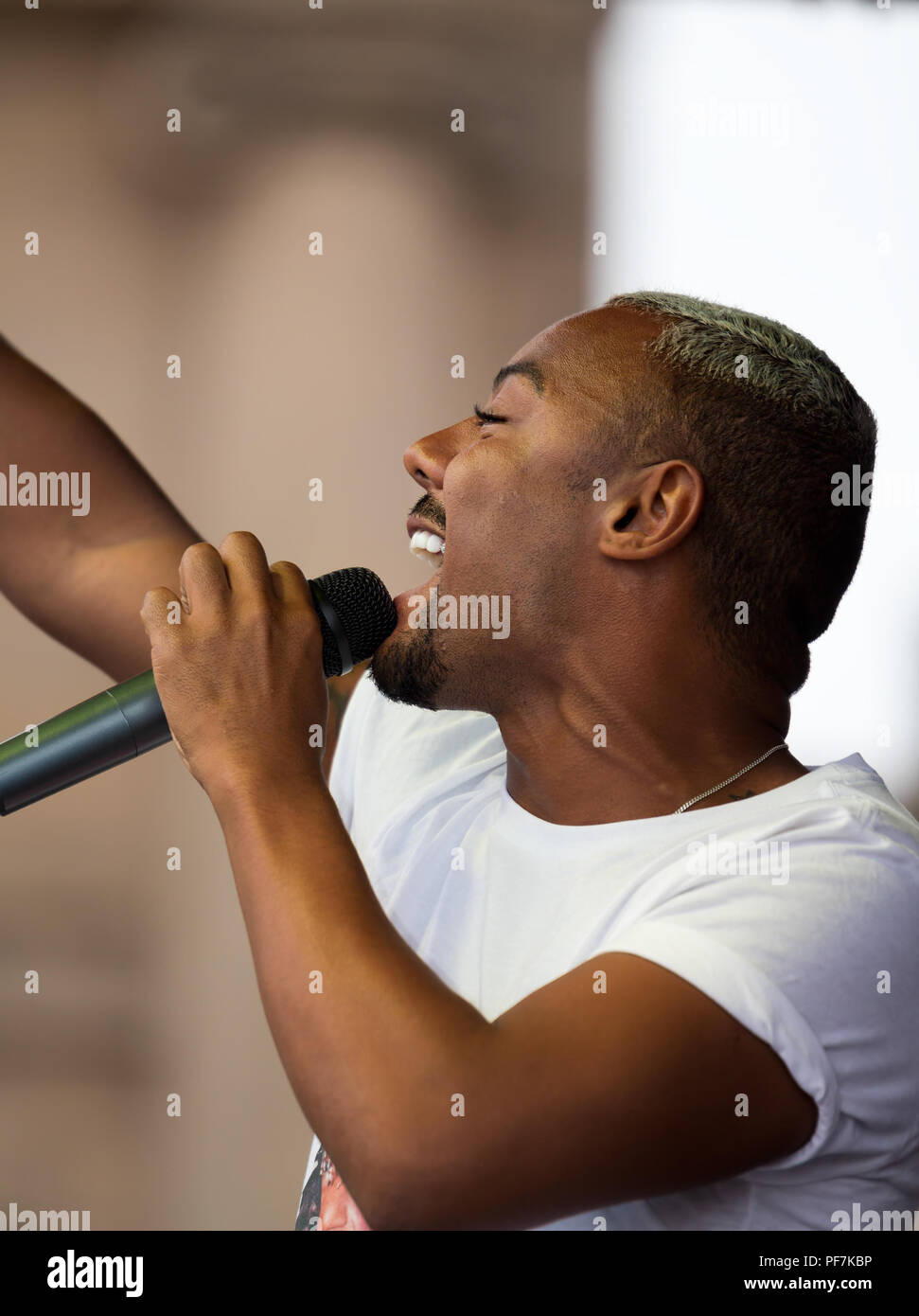 Marcus Collins performing on stage at the 2018 Chester Pride Festival ...