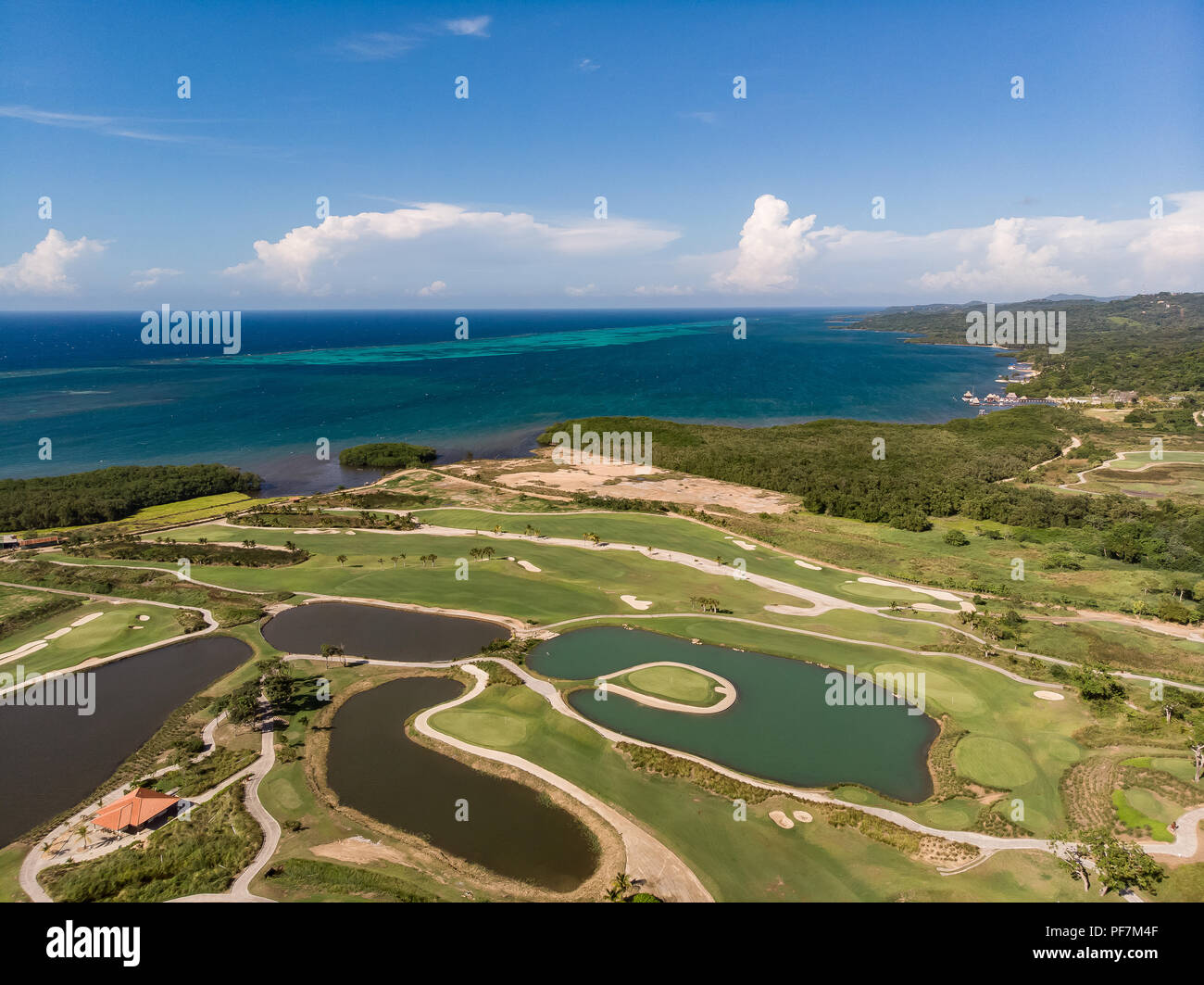 Aerial View of Tropical Golf Course with Ocean Background Stock Photo ...