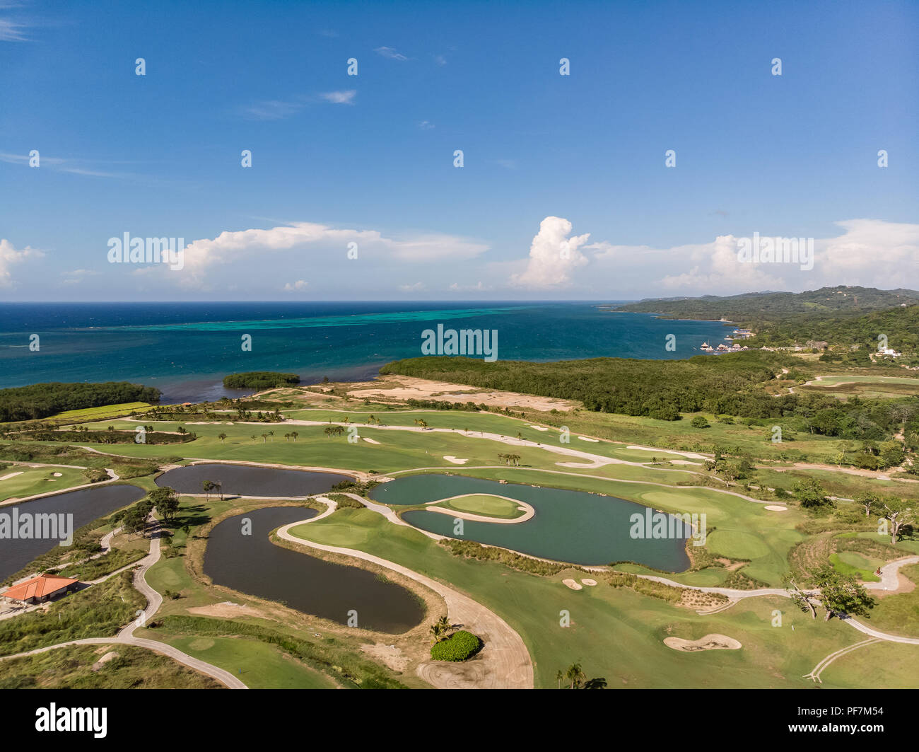 Aerial View of Tropical Golf Course with Ocean Background Stock Photo ...