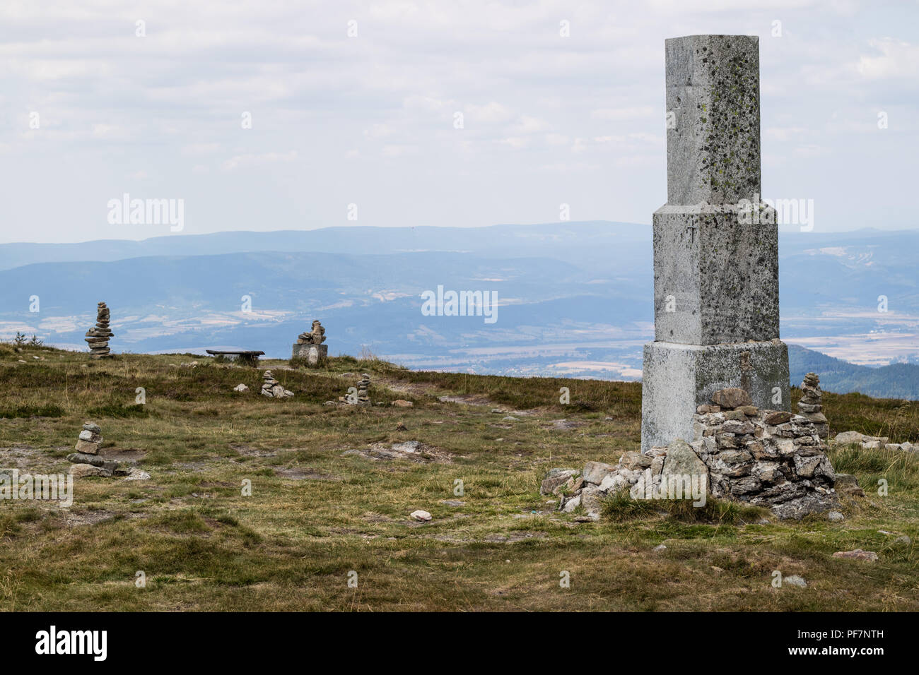 Stones stacked on top of a mountain. The summit in central europe ...