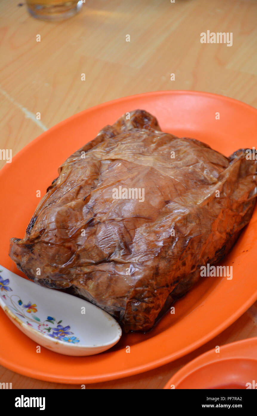 Beggar chicken served in restaurant in Malaysia Stock Photo - Alamy