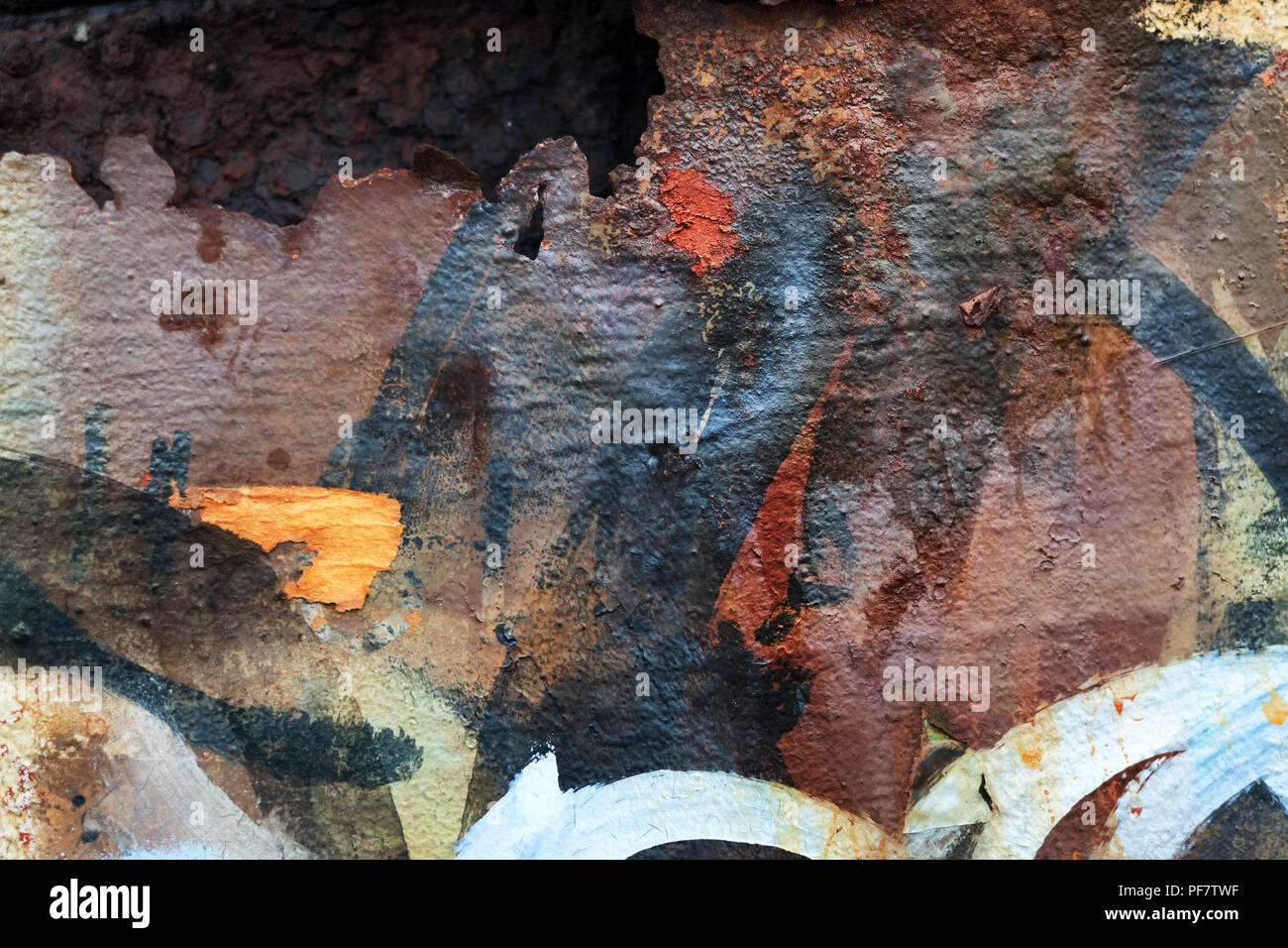 rusty metal wall with graffiti Stock Photo - Alamy