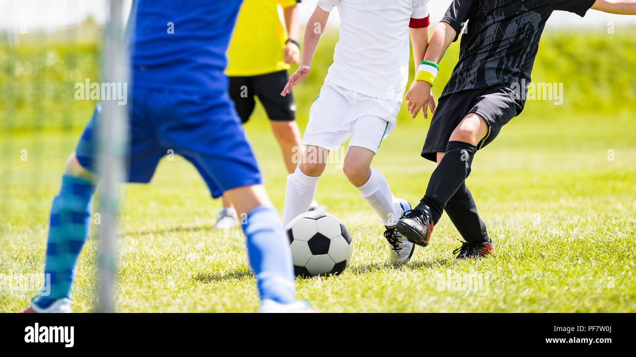 Kicking football hi-res stock photography and images - Alamy