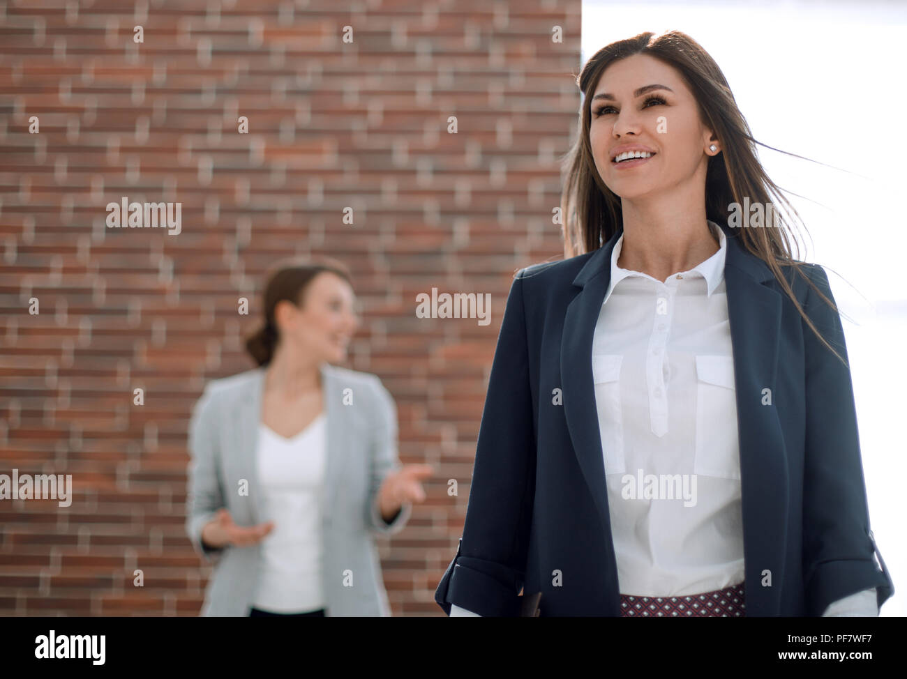 successful business woman standing in her office Stock Photo - Alamy