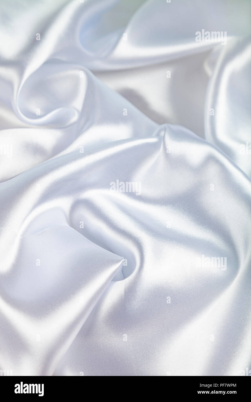 White silk fabric with folds. Beautiful background Stock Photo - Alamy