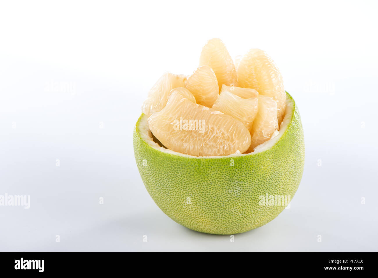 fresh and peeled pomelo(shaddock), grapefruit with slices isolated on ...