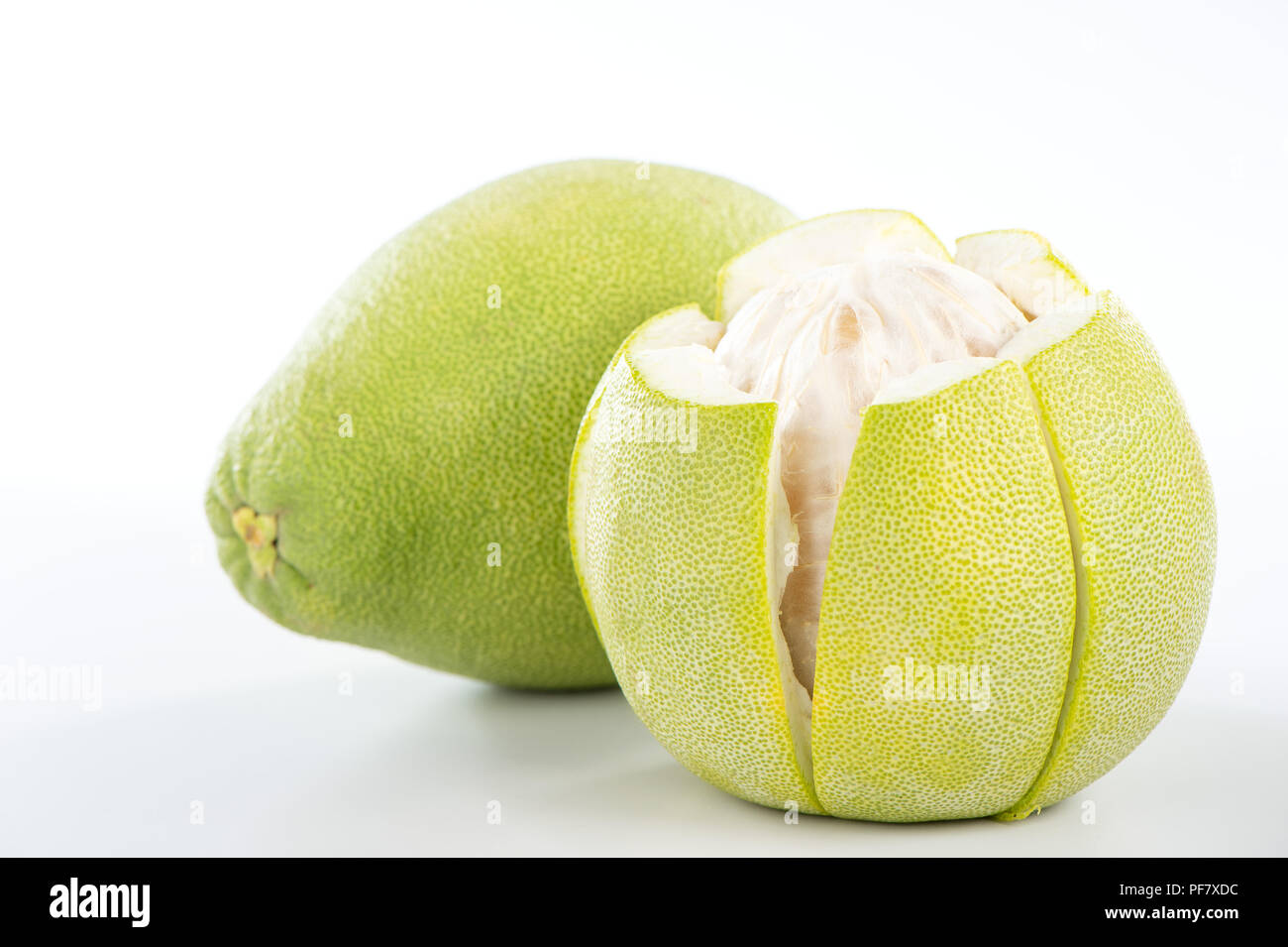 fresh and peeled pomelo(shaddock), grapefruit with slices isolated on ...