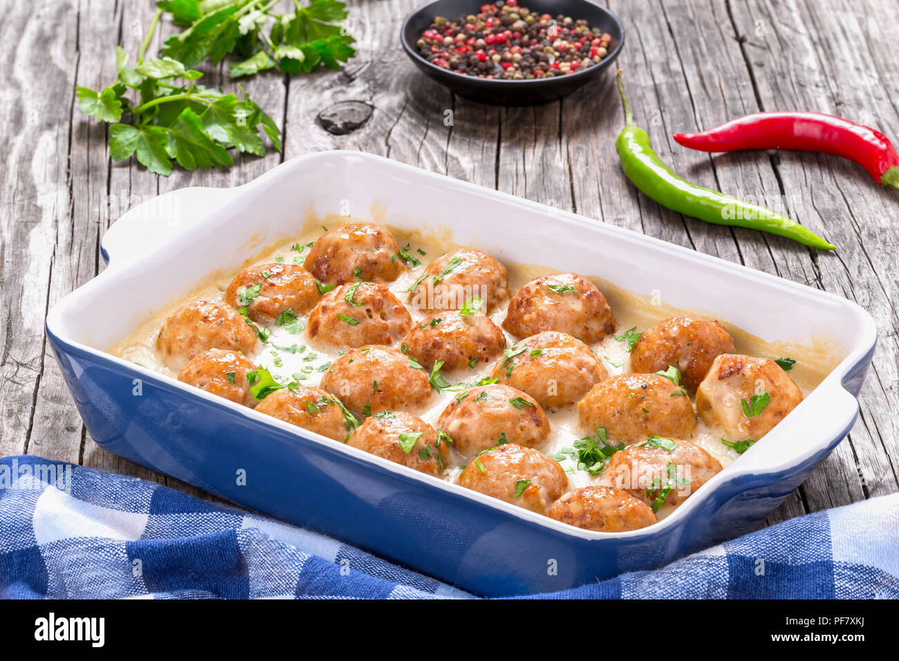 meatballs smothered in a creamy gravy sauce, close-up Stock Photo - Alamy