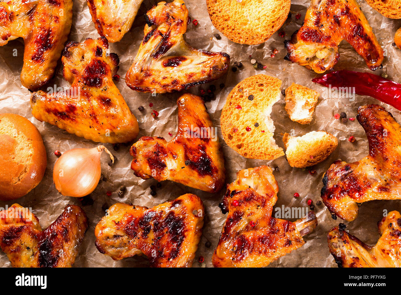 roasted chicken wings with spices, top view, close-up Stock Photo - Alamy