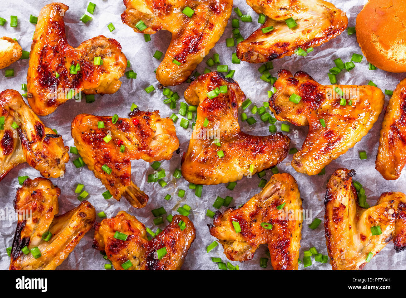 roasted chicken wings with spices, top view, close-up Stock Photo - Alamy