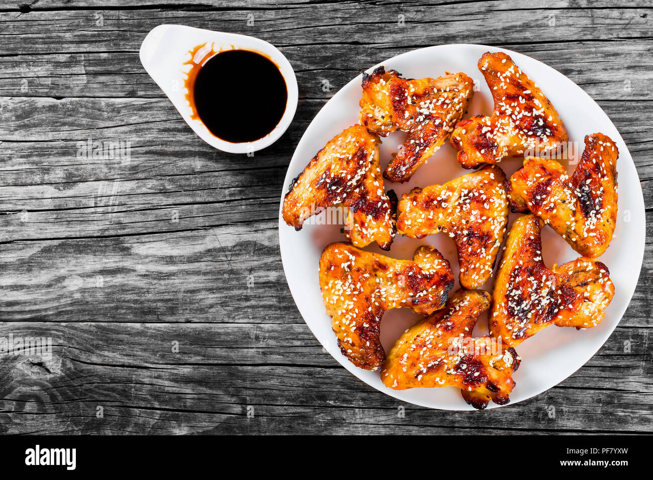 roasted chicken wings with spices, top view, close-up Stock Photo - Alamy