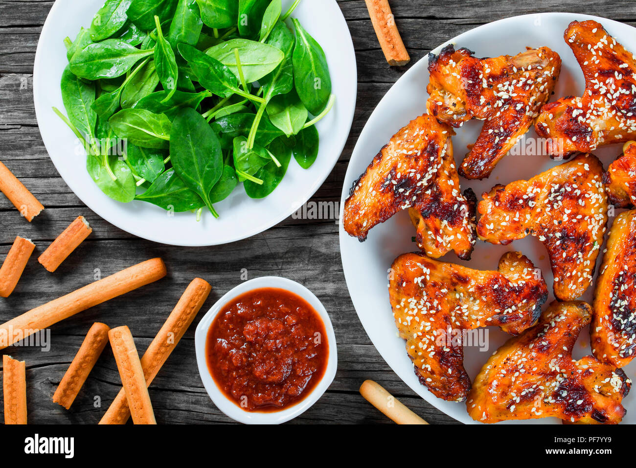 roasted chicken wings with spices, top view, close-up Stock Photo - Alamy