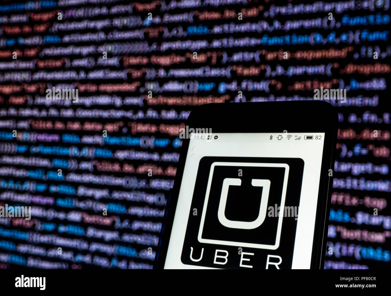 Uber company logo seen displayed on a smart phone Stock Photo - Alamy
