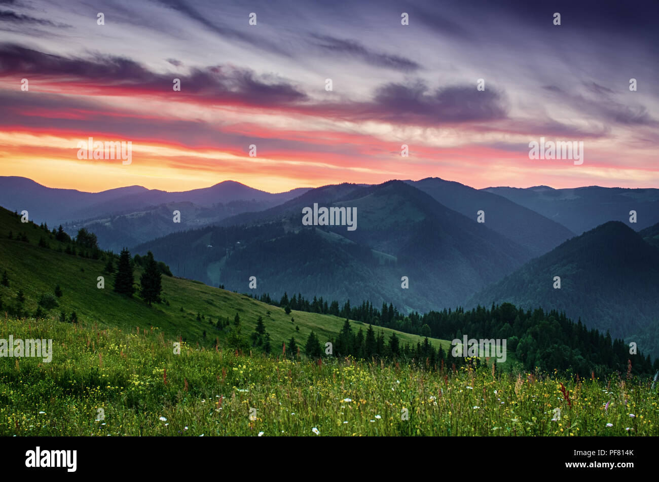 Colorful mountain sunset Stock Photo - Alamy