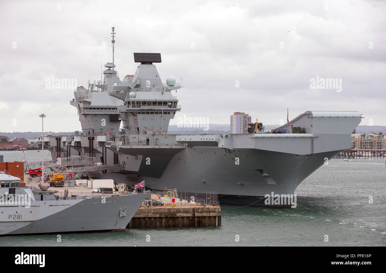 HMS Queen Elizabeth, pictured in Portsmouth naval dockyard, is the lead ...