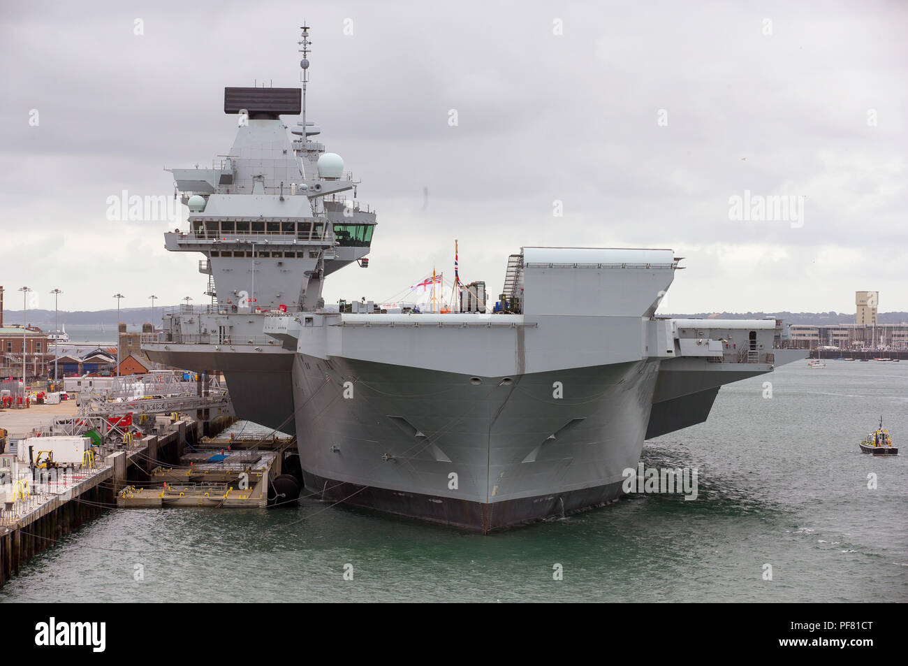 HMS Queen Elizabeth, pictured in Portsmouth naval dockyard, is the lead ...