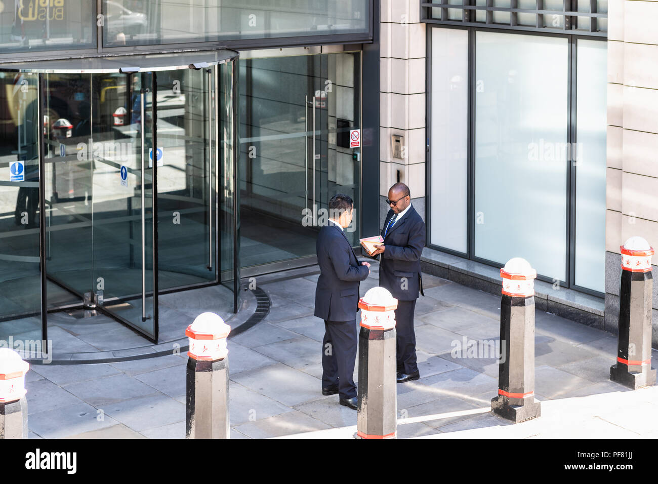 London, UK - June 22, 2018: Two Businessmen, men wearing suits ...