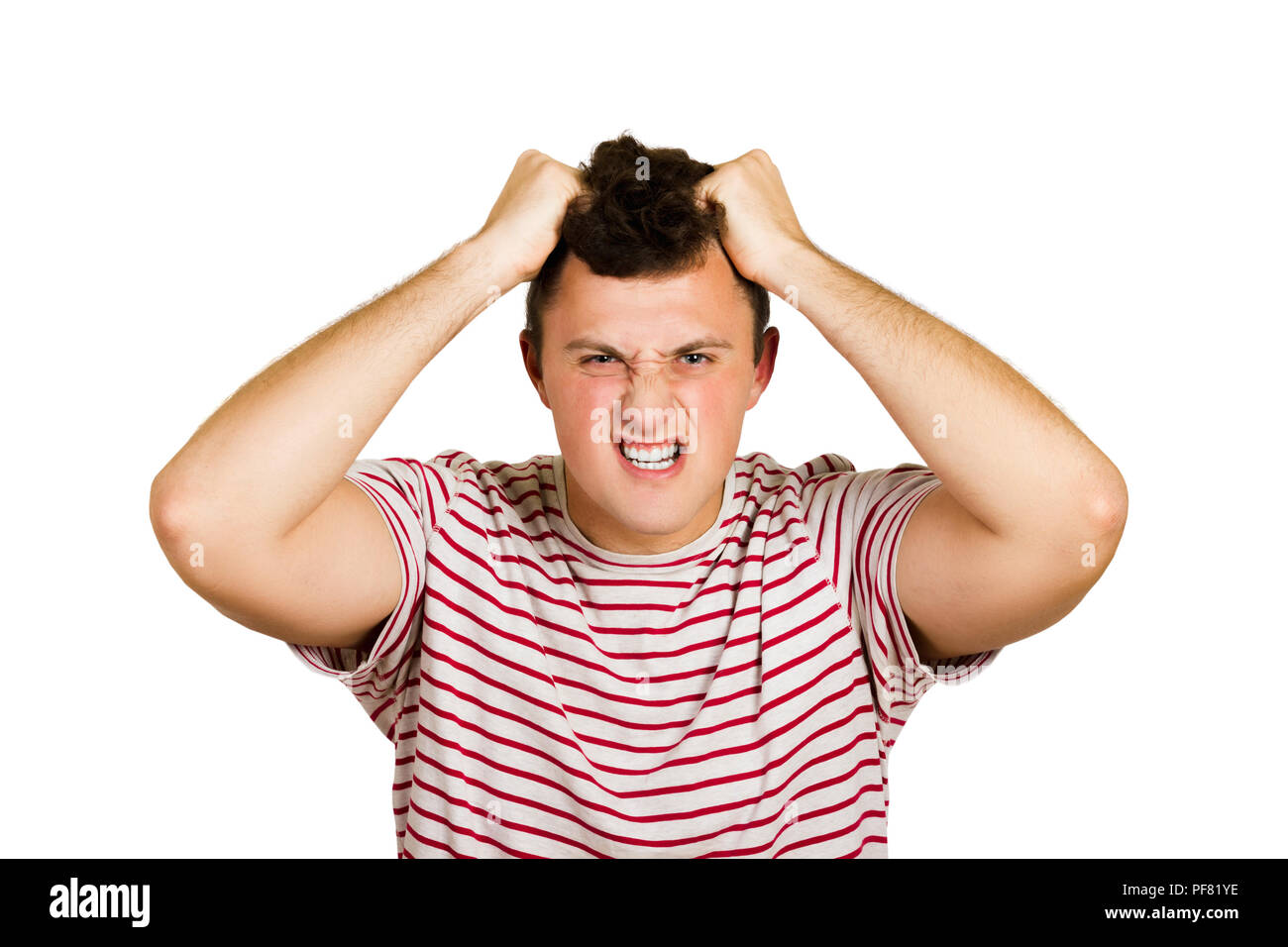 the evil guy tears his hair from anger. emotional guy isolated on white ...