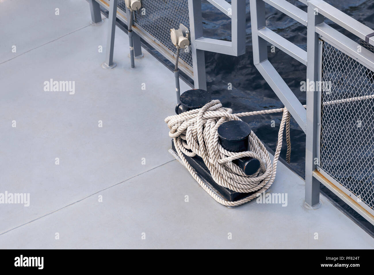 top view of a rope reel on an iron pin on a pier Stock Photo - Alamy