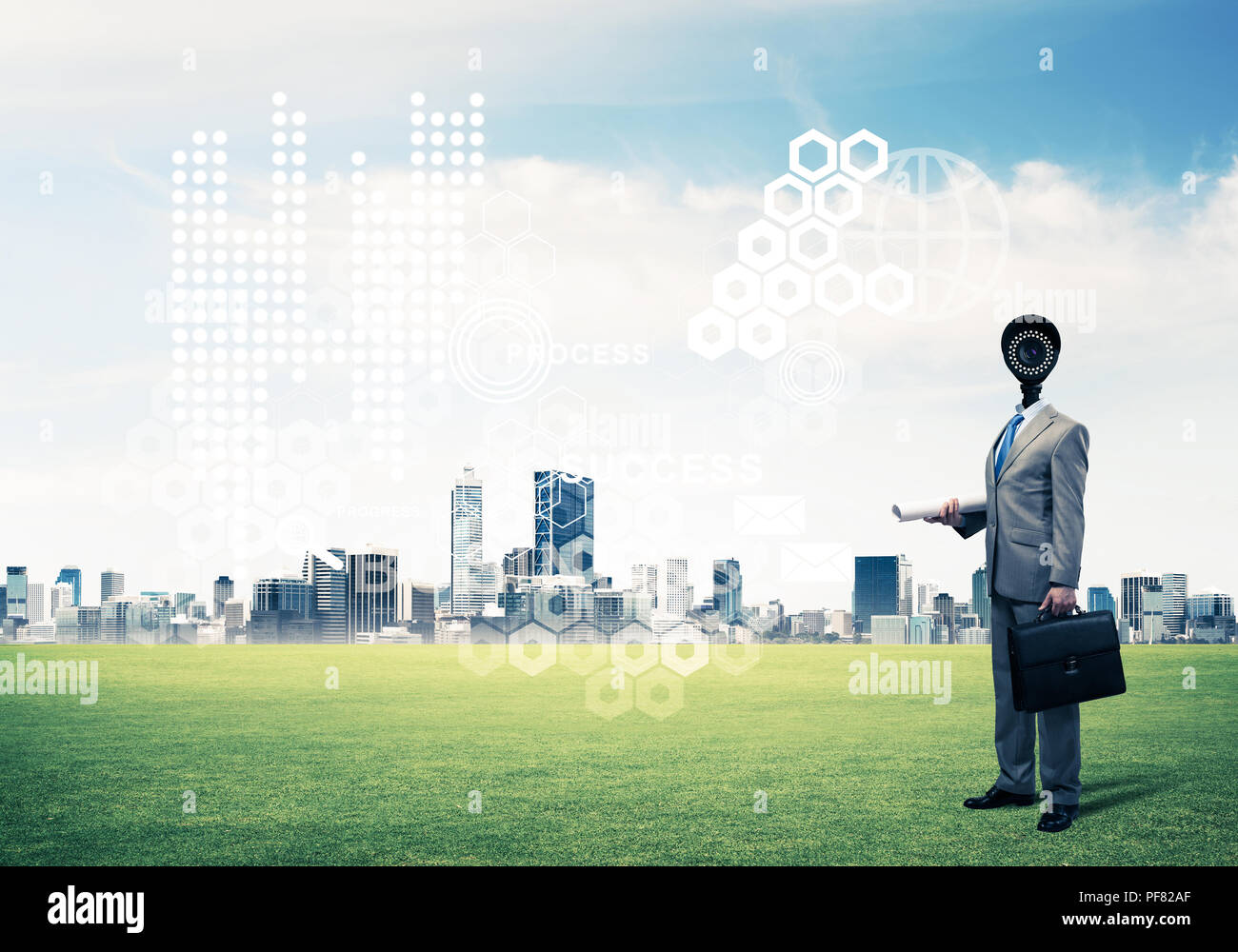 Camera headed man standing on green grass against modern citysca Stock ...