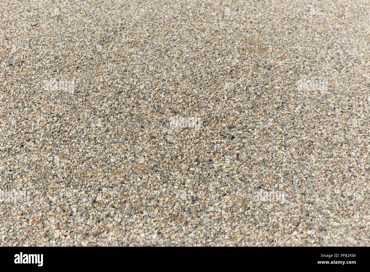 Tiny little pebbles scattered across the surface of the earth Stock ...