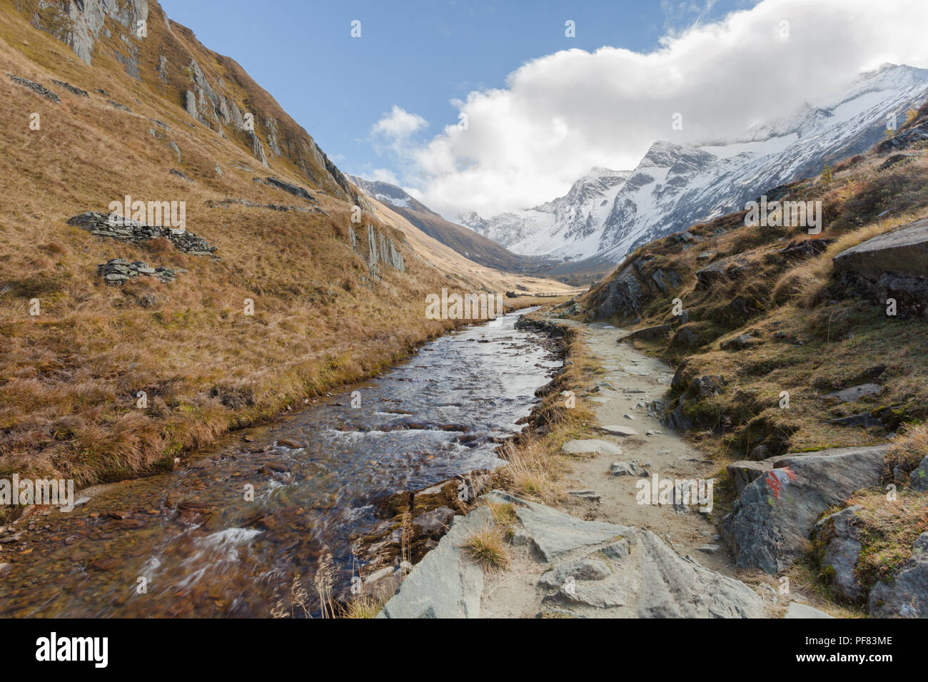 walking at fall in a mountain valley Stock Photo - Alamy