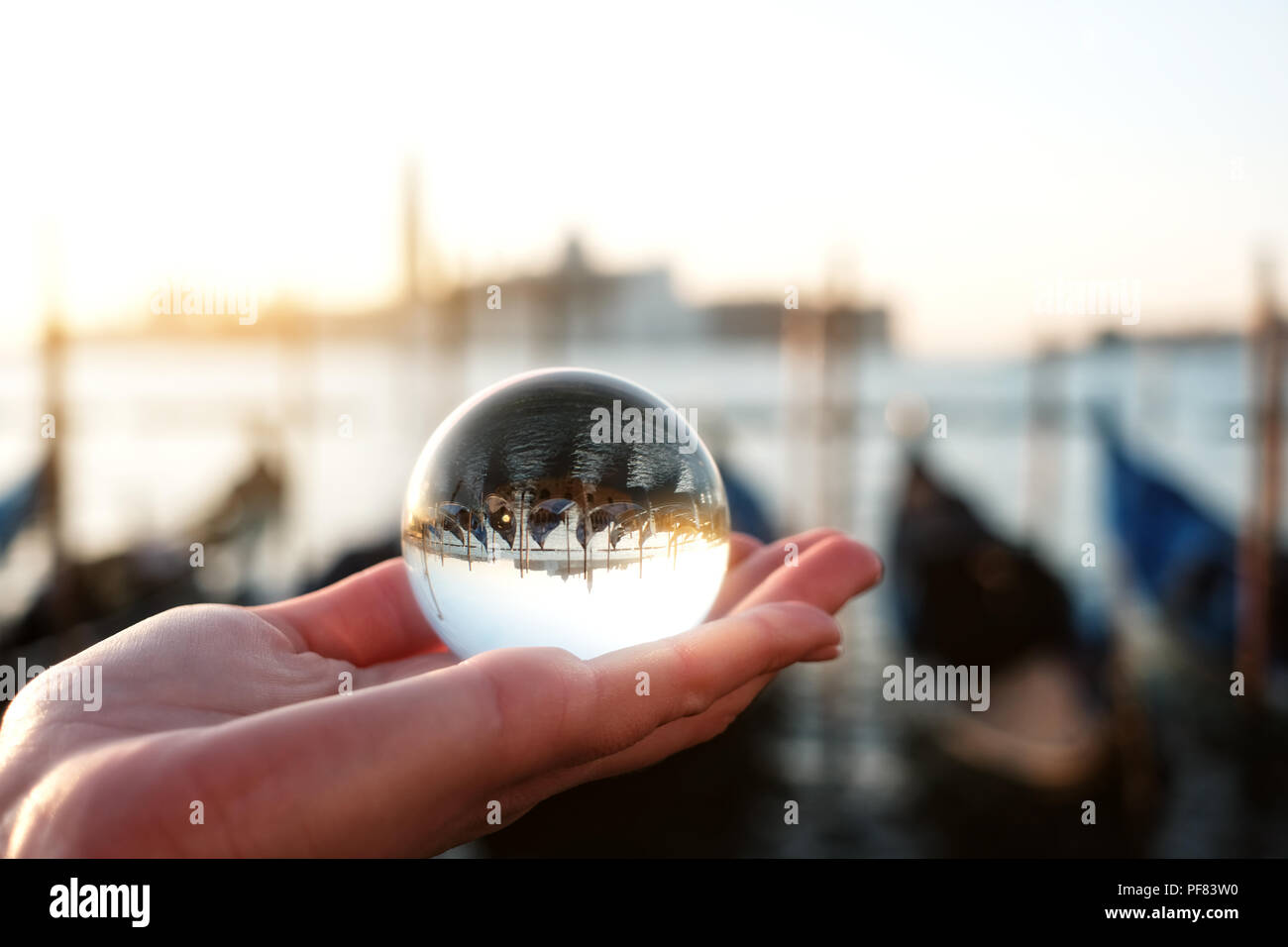 Venice gondola view through crystal glass ball Stock Photo - Alamy