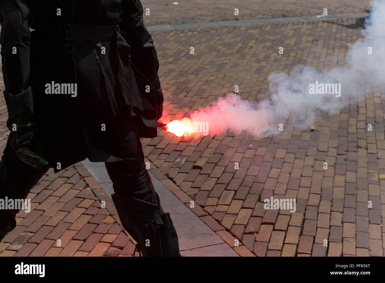 A burning flare guiding the pathway for those behind Stock Photo - Alamy