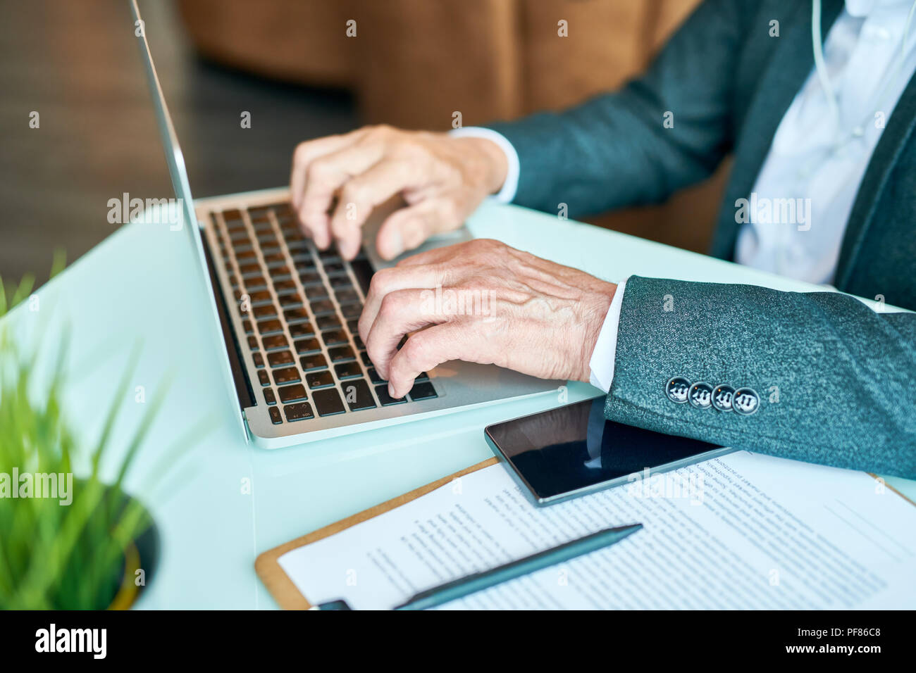 Senior Businessman Typing Close Up Stock Photo - Alamy