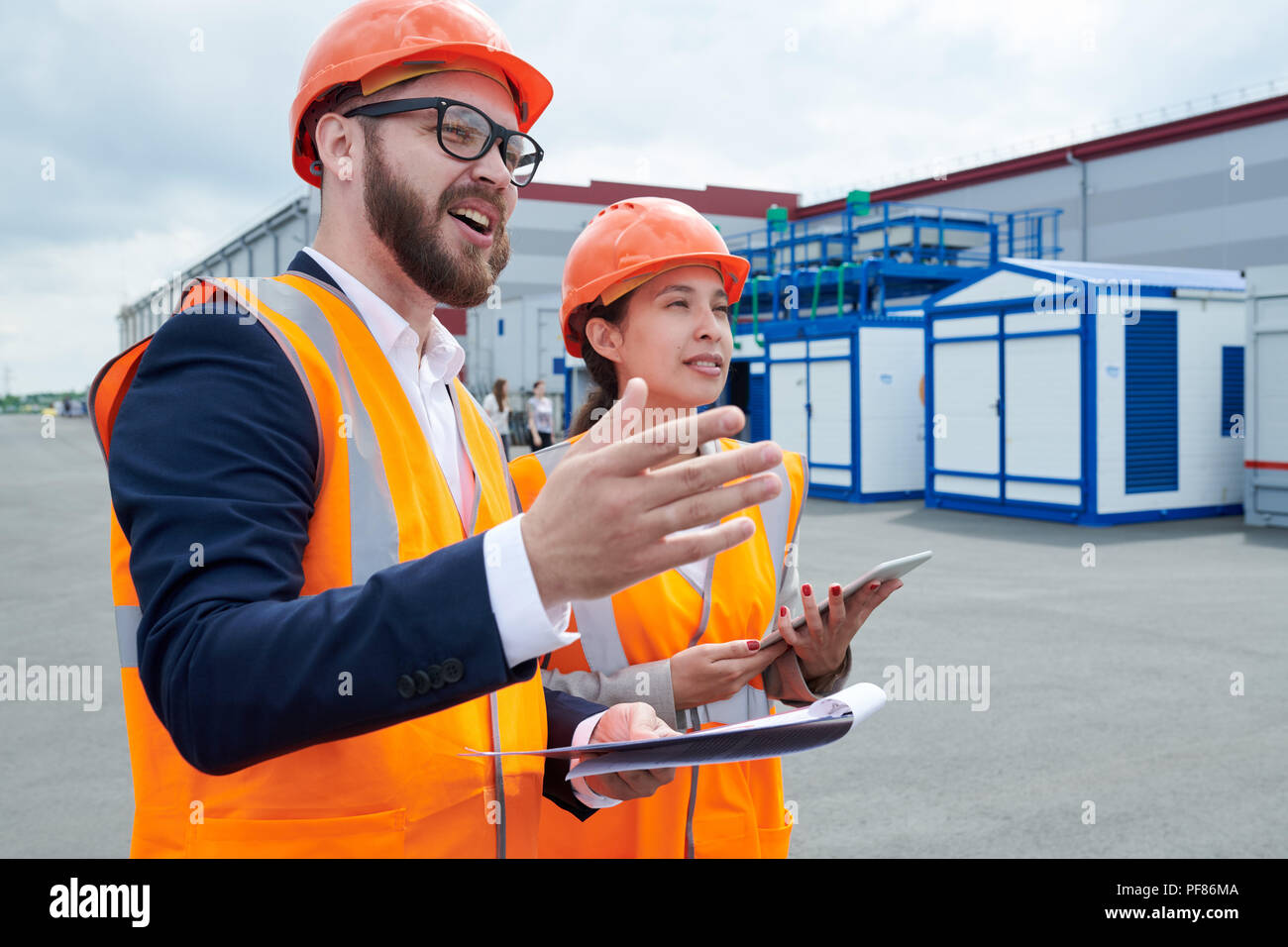 Factory Workers Outdoors Stock Photo - Alamy