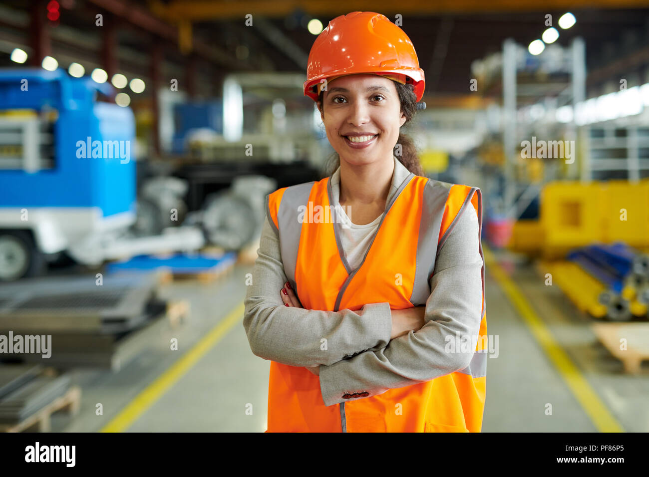 Confident Factory Worker Posing Stock Photo - Alamy