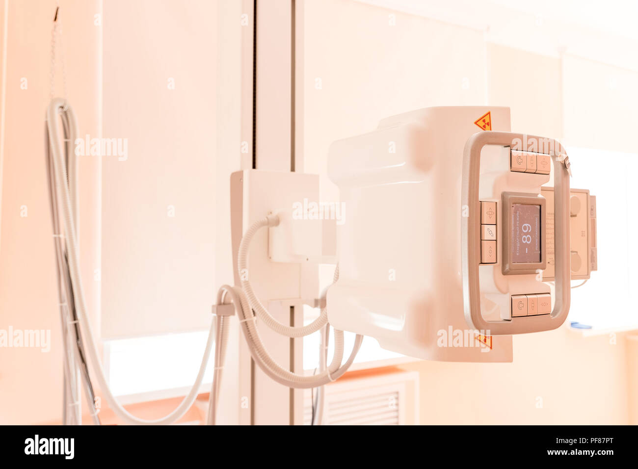 X-Ray machine close up in contemporary medical center.device with x-ray ...