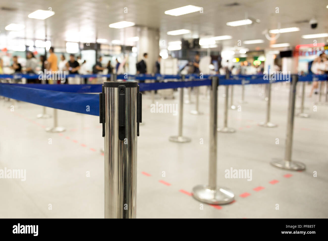 Passengers check-in line at the airport on vacation Stock Photo - Alamy