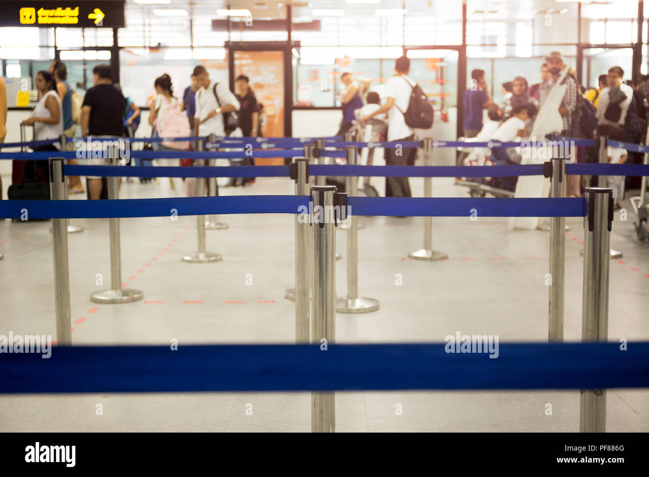 Passengers check-in line at the airport on vacation Stock Photo - Alamy