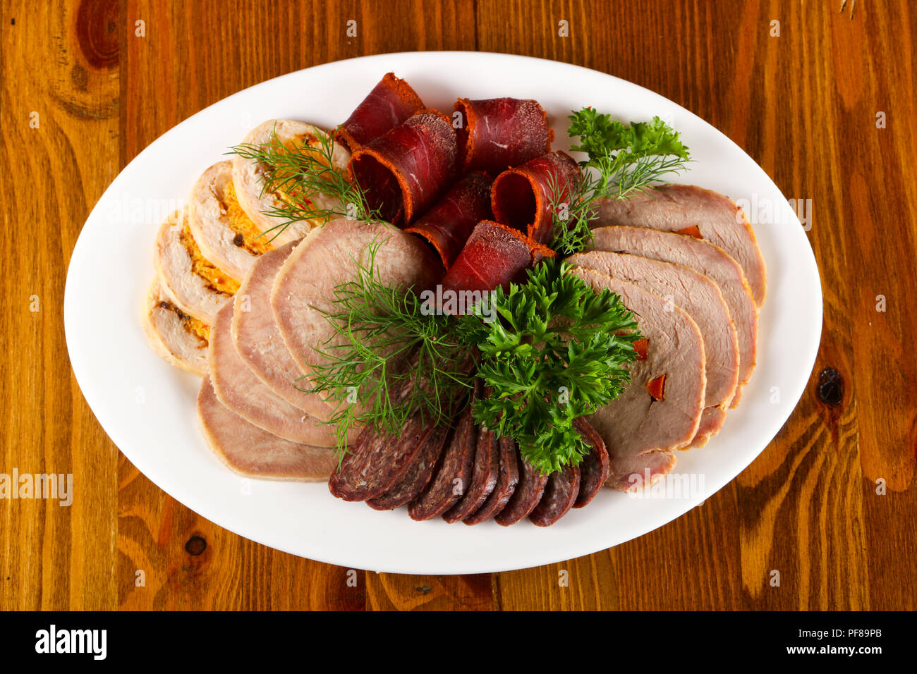 Meat plate - tongue, beef, chicken Stock Photo - Alamy