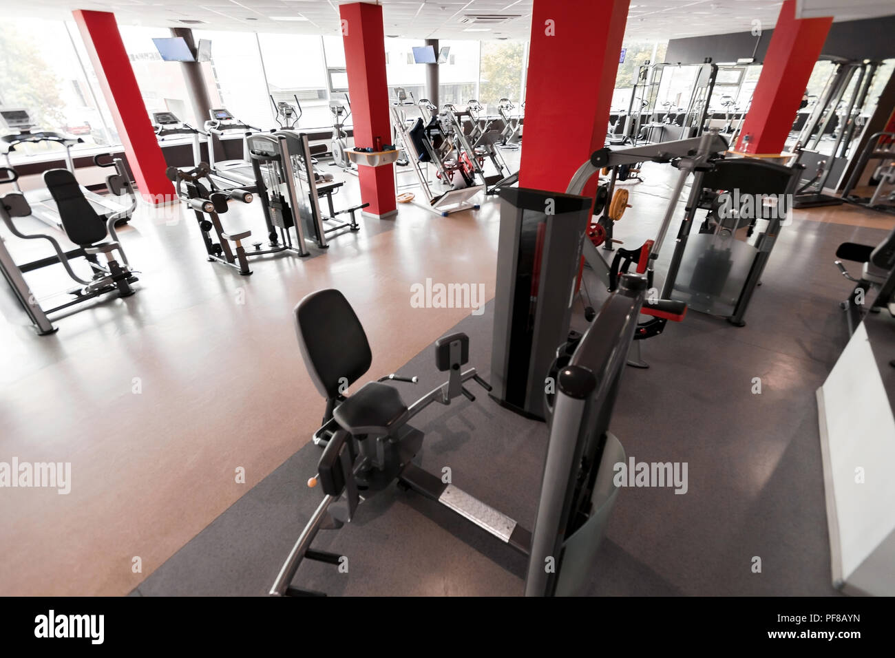 modern gym interior with diversity of fitness stations Stock Photo - Alamy