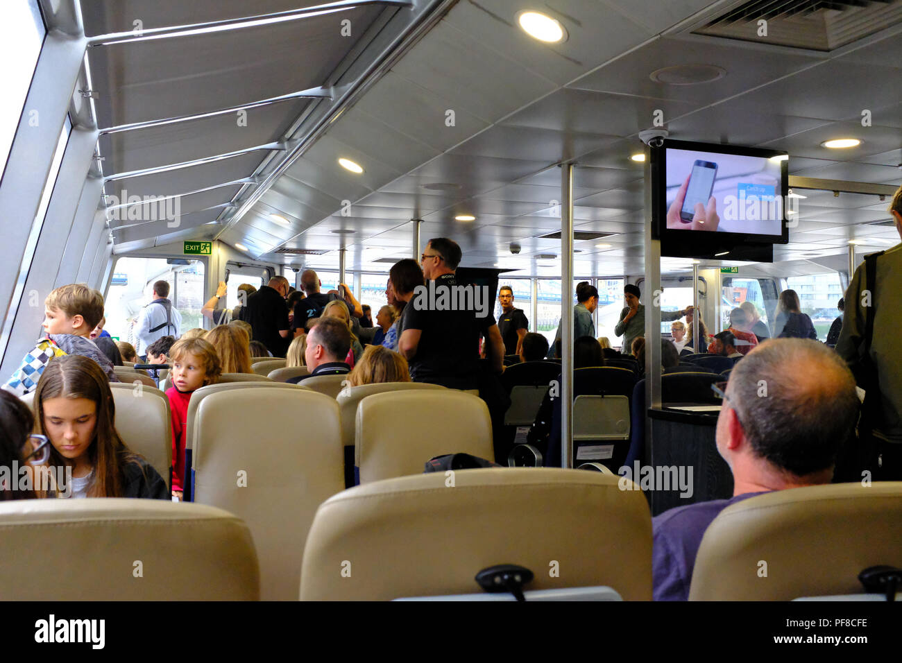 Thames clipper boat passengers hi-res stock photography and images - Alamy