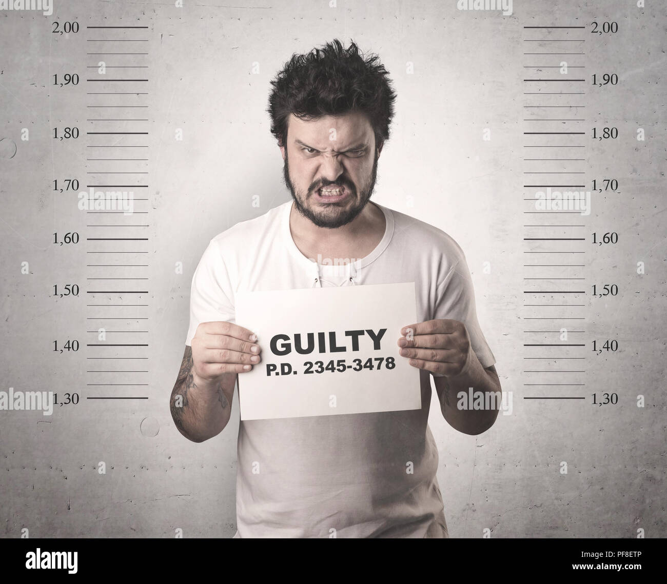 Caught guilty man with ID signs on his hand Stock Photo - Alamy
