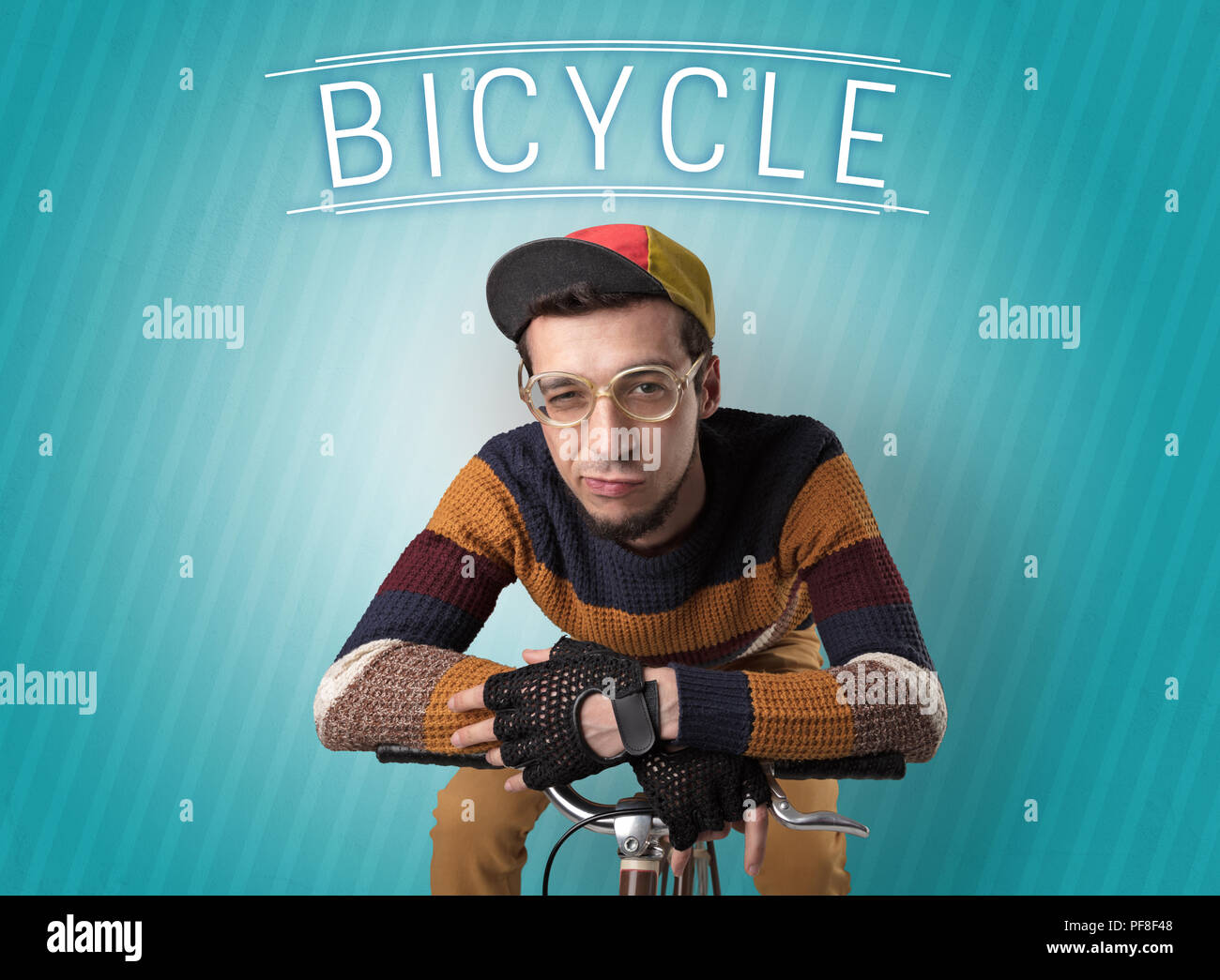 Kooky young guy on a bike with cyclist keywording and streaky ...