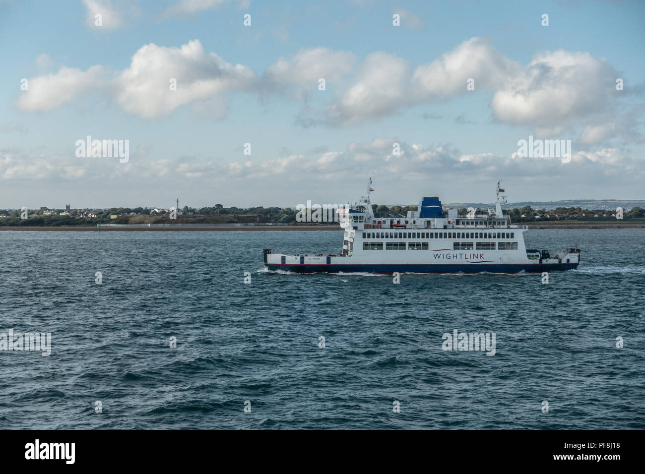 car ferry transporting vehicles across a body of water Stock Photo - Alamy
