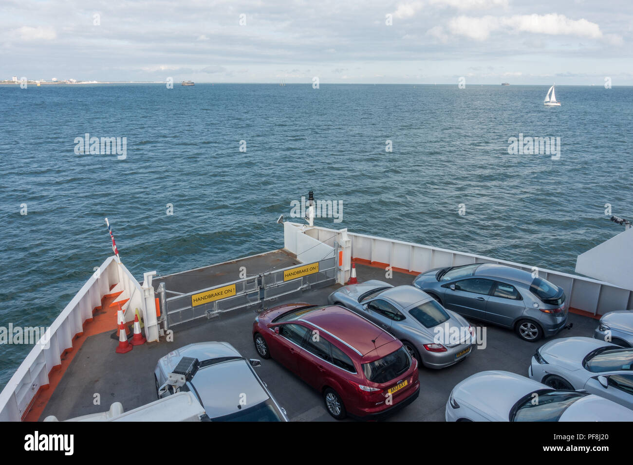car ferry transporting vehicles across a body of water Stock Photo - Alamy