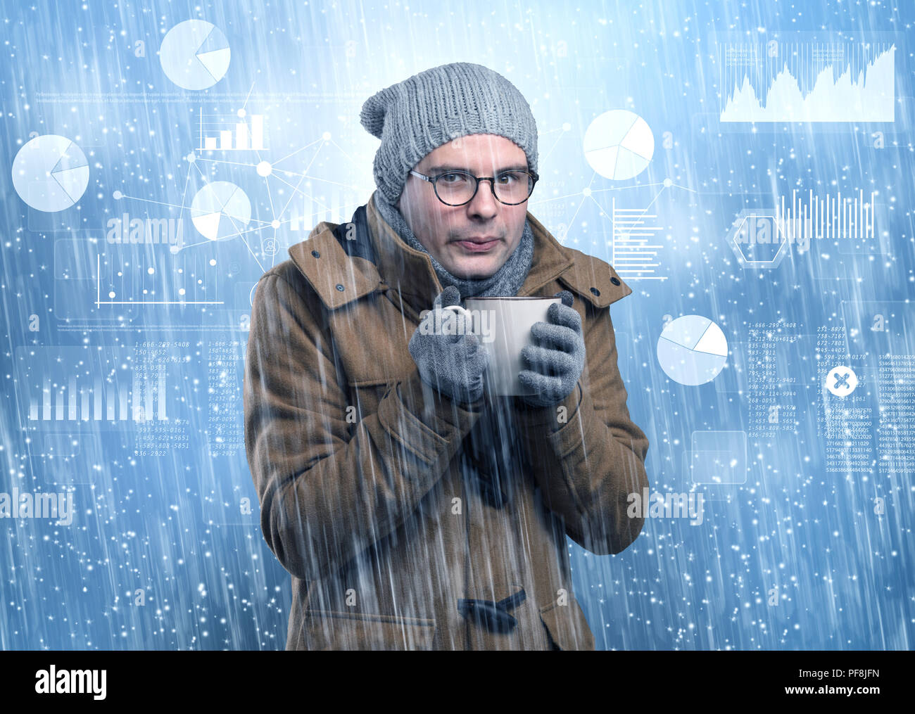Young businessman shivering with graphs, reports and chart concept ...