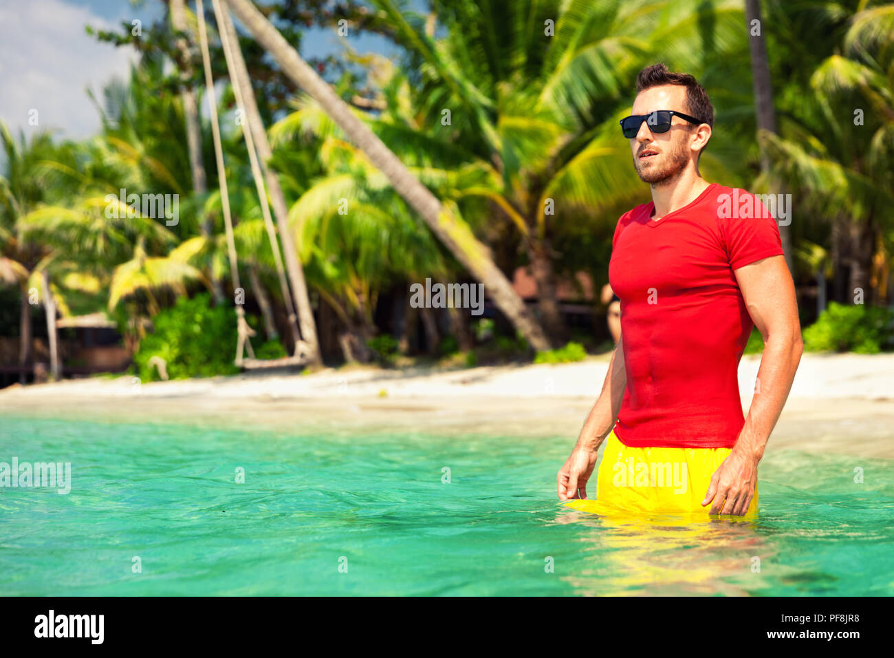 Portrait travel men enjoy vacation on tropical beach Stock Photo - Alamy